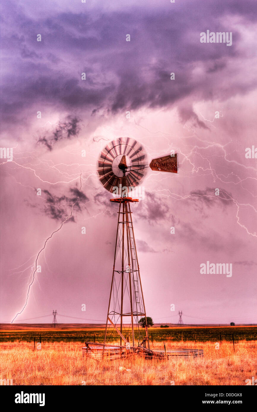 Lightning and lone windmill, eastern plains of Colorado, USA Stock ...