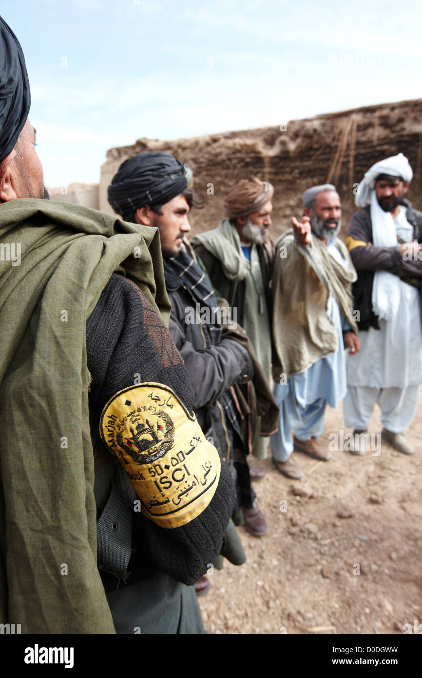 Afghan militiamen prepare for a combat operation in the Helmand ...