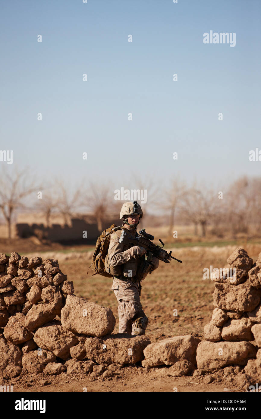 United States Marine on a combat patrol near the city of Marjah, in the ...
