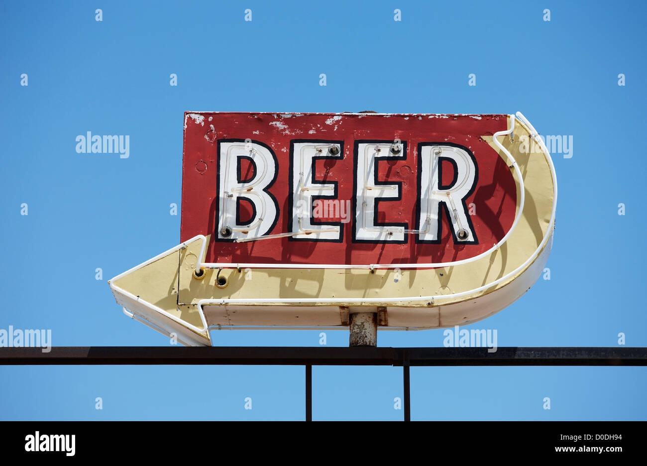 Roadside beer sign, with arrow Stock Photo - Alamy