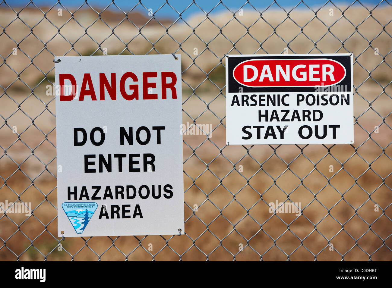 Danger signs warning of Arsenic poison danger, California Desert Stock ...