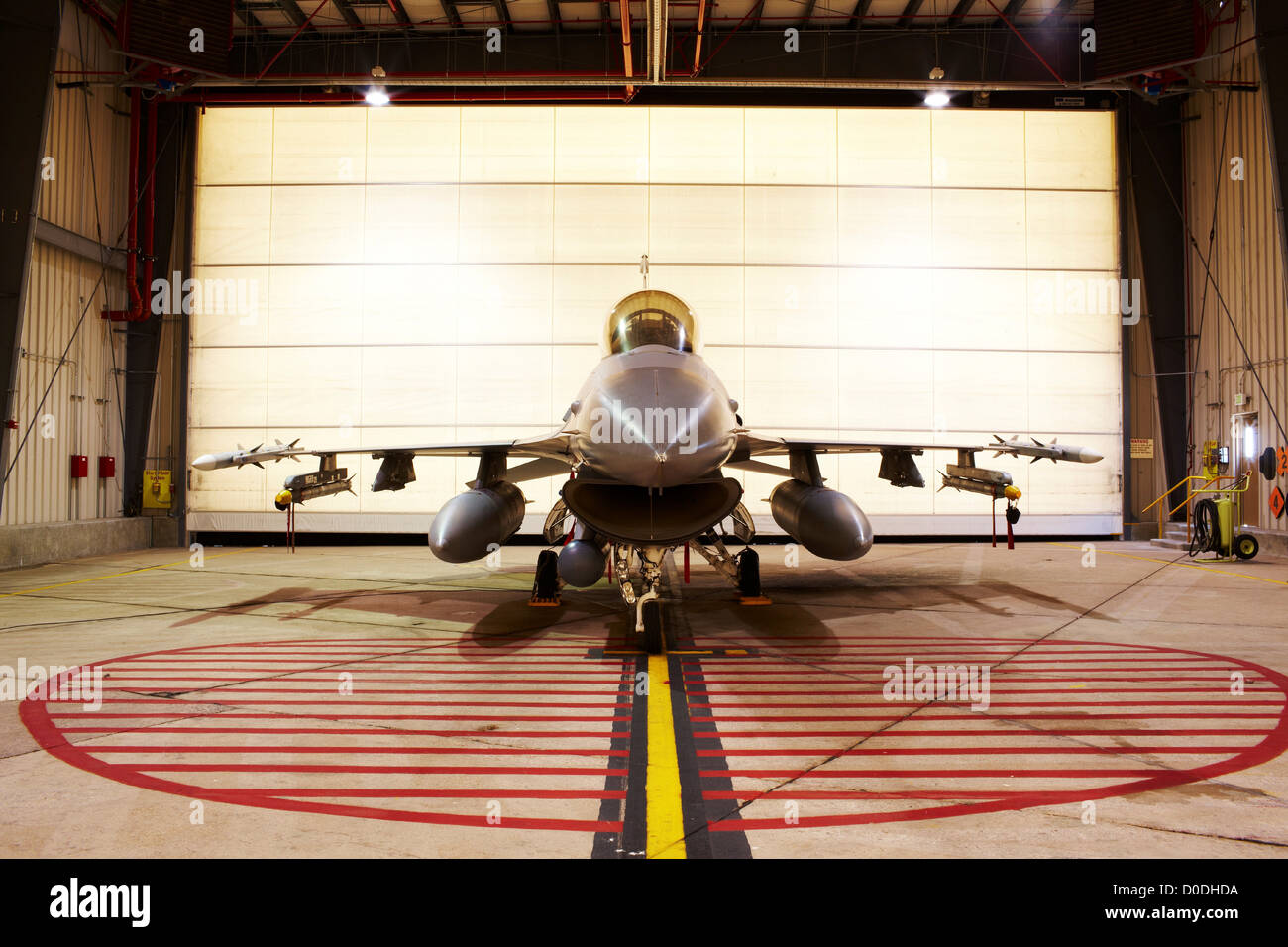 F-16, loaded with live weapons, in alert hangar, Buckley Air Force Base ...