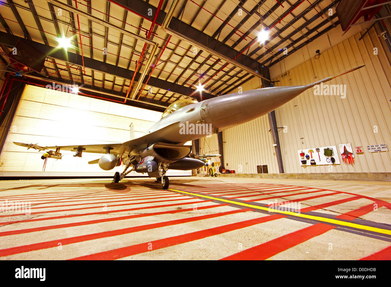 F-16, loaded with live weapons, in alert hangar, Buckley Air Force Base ...