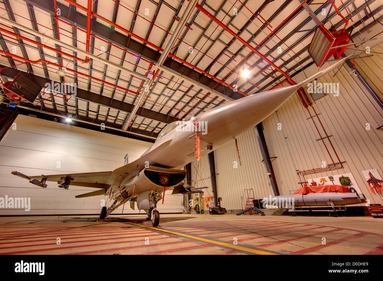 F-16, loaded with live weapons, in alert hangar, Buckley Air Force Base ...
