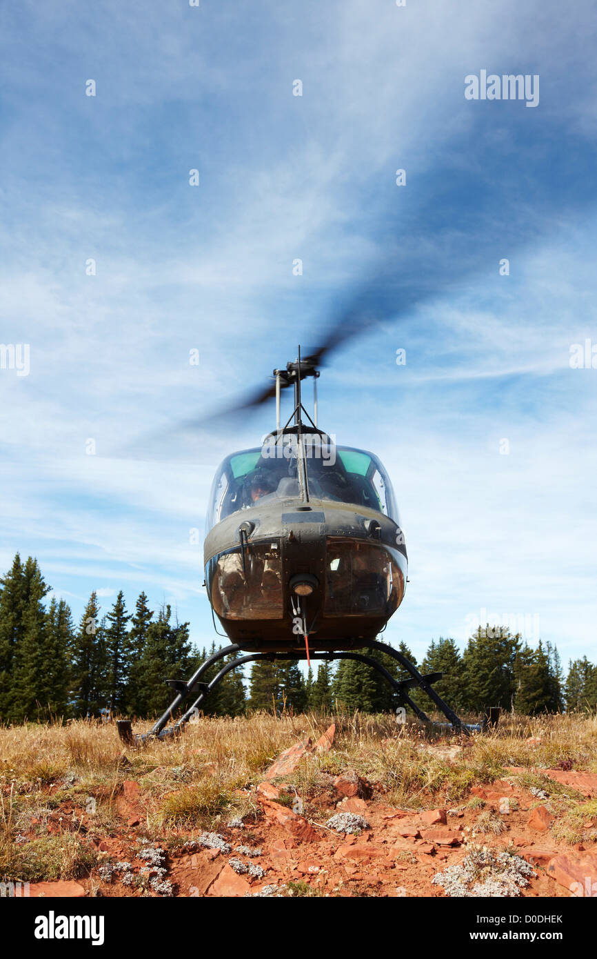 Bell OH-58 Kiowa helicopter during high altitude mountainous training ...