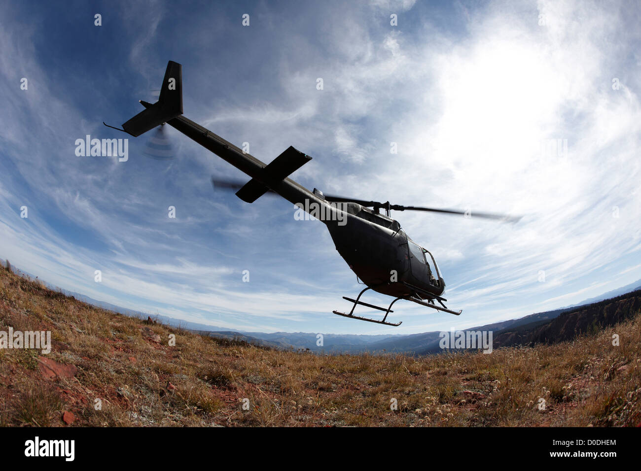 Bell OH-58 Kiowa helicopter during high altitude mountainous training ...