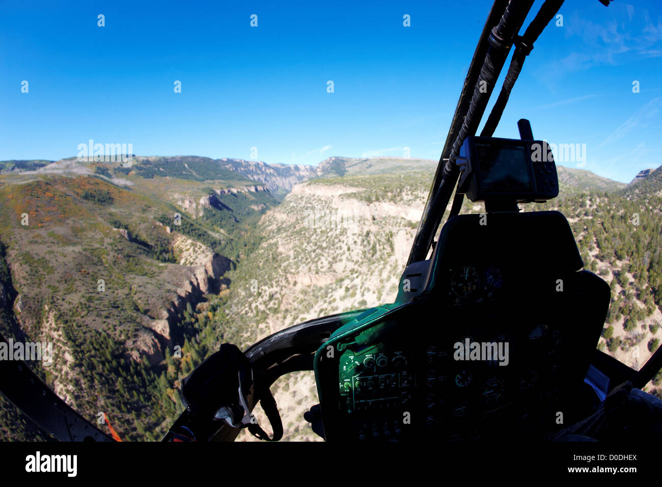 View of canyon high in the Rocky Mountains of Colorado from the cockpit ...