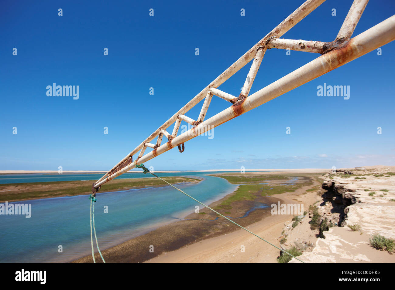 Pulley and boom for unloading items from a boat at a dock in southern ...
