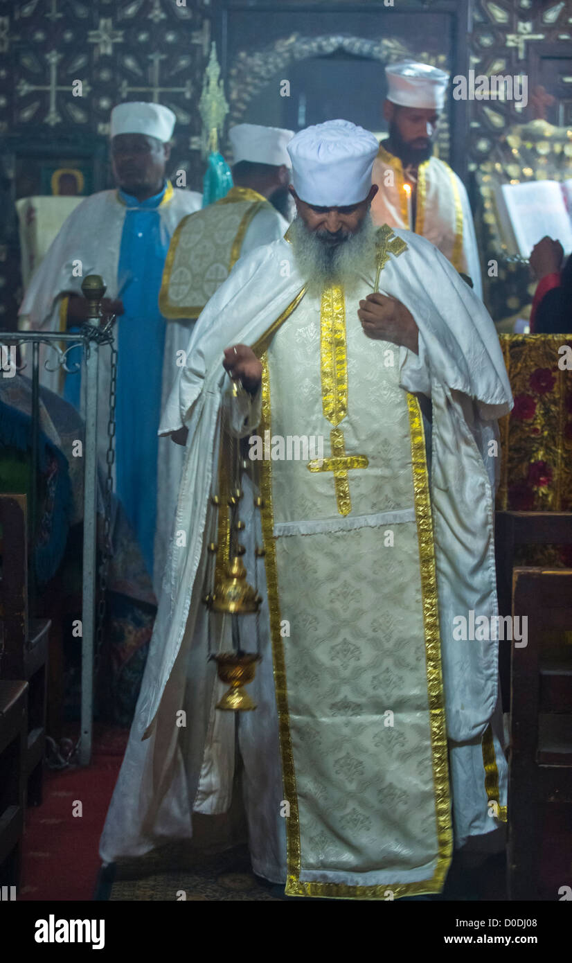 Ethiopian priests prays at the Ethiopian Church in Jerusalem , Israel ...