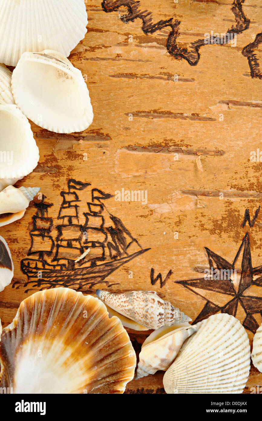 Shells on the sea chart with ship on the order of antiquities Stock ...