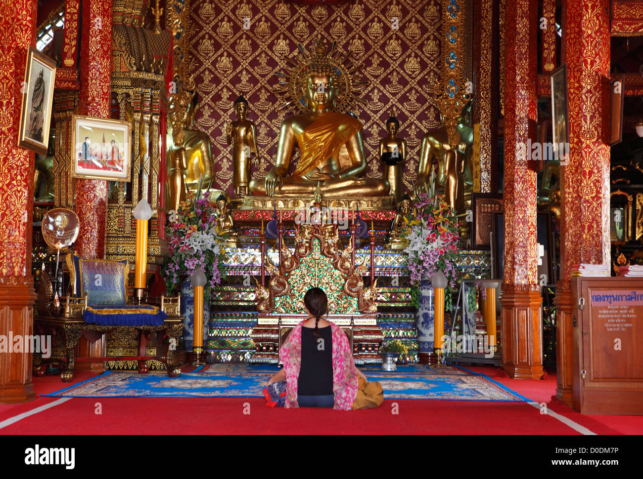 Woman praying in temple hi-res stock photography and images - Alamy