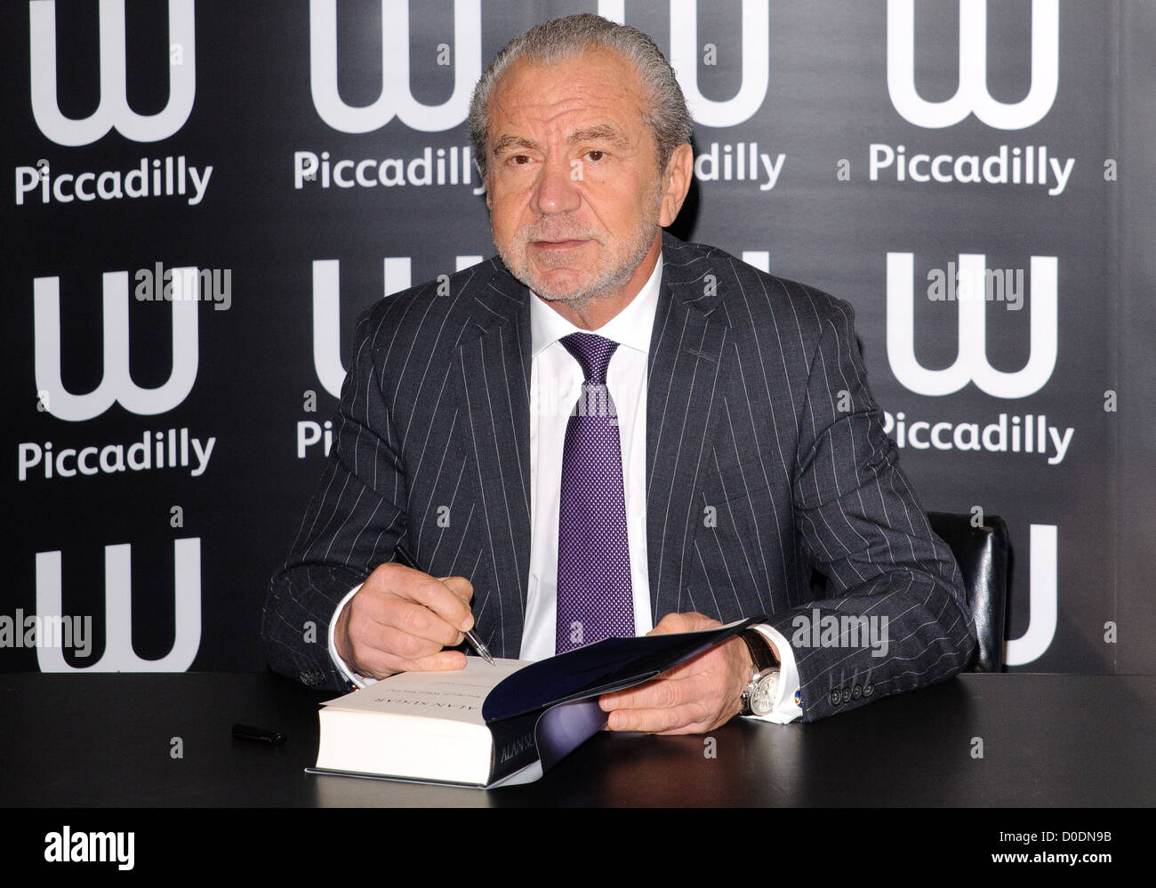 Sir Alan Sugar Signs Copies Of His New Autobiography You See What You