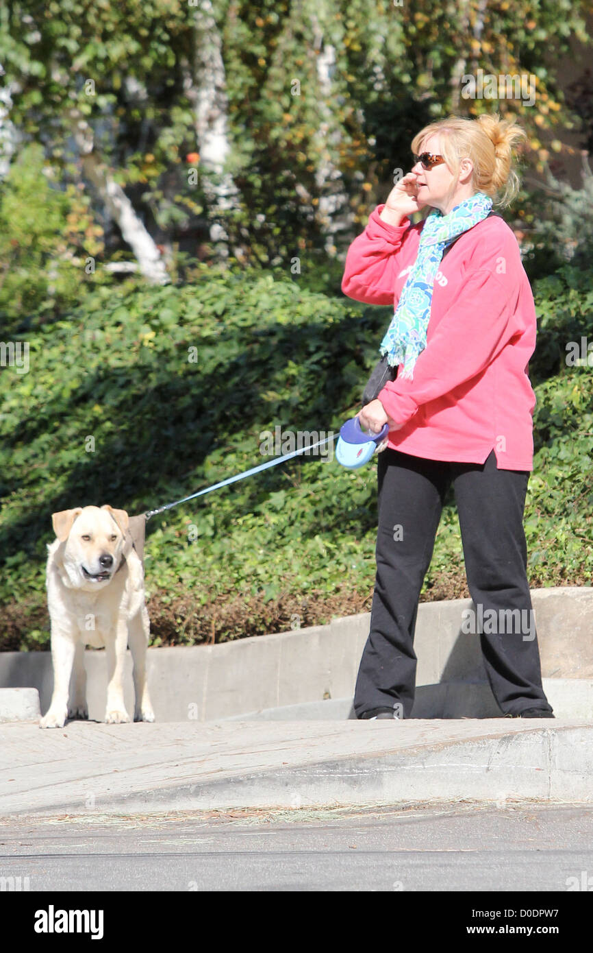 Television presenter Bonnie Hunt walks her dog near her home in ...