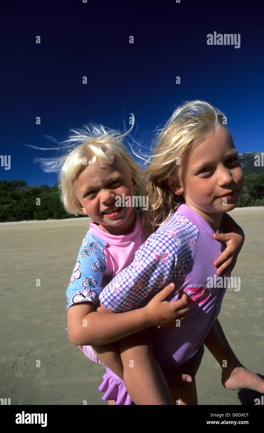 Piggy back sisters hi-res stock photography and images - Alamy