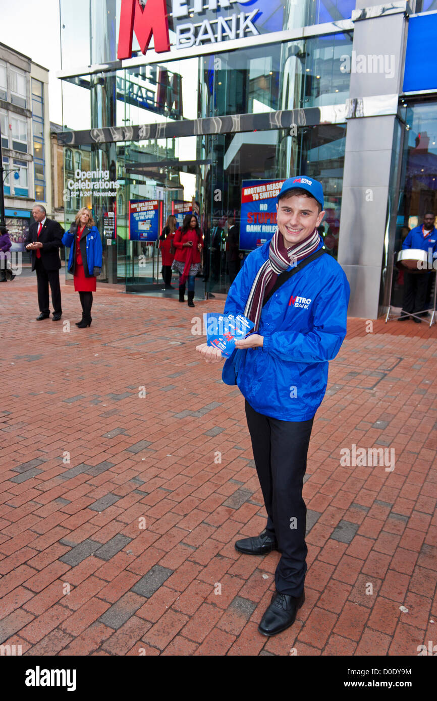 An employee at the opening of the new branch of Metro Bank in Reading ...