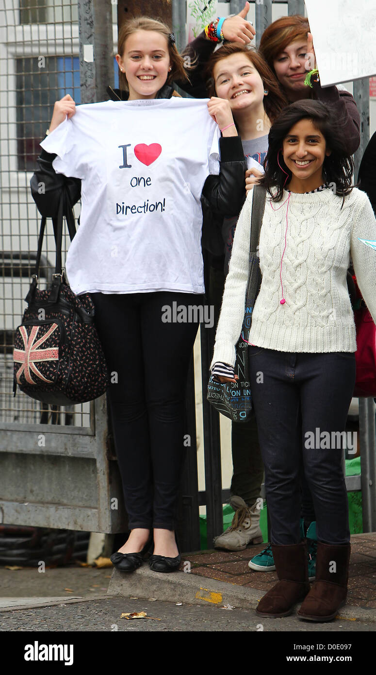 X Factor fans wait for contestants to arrive at a studio for rehearsals ...