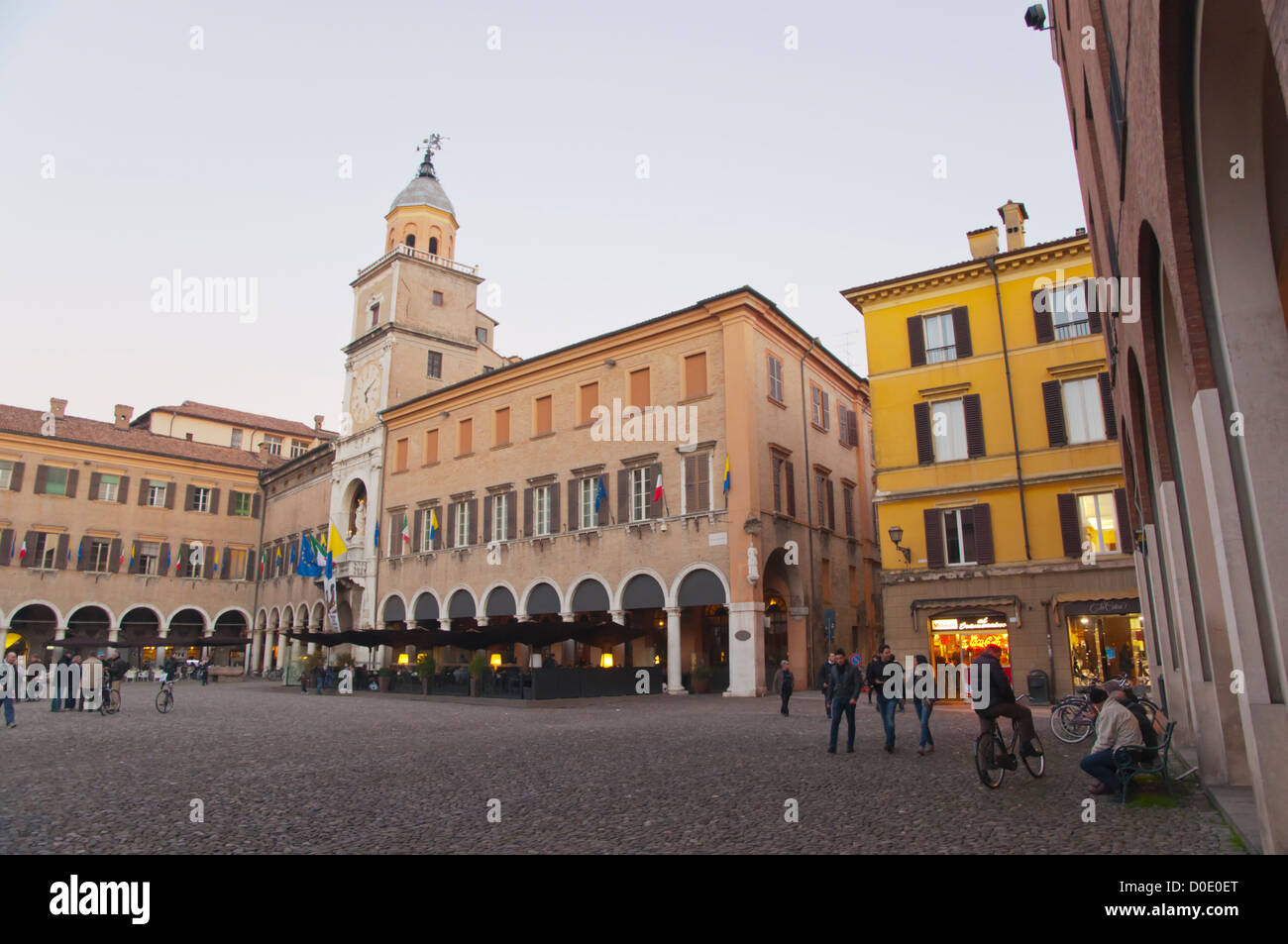 People on passeggiata evening walk Piazza Grande square central Modena ...