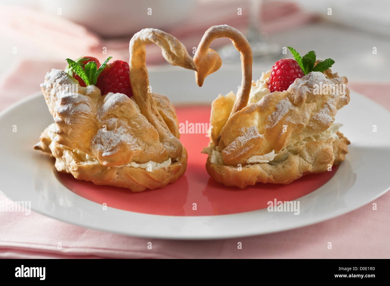 Choux pastry swans Cygnes en pâte à choux Stock Photo, Royalty Free ...