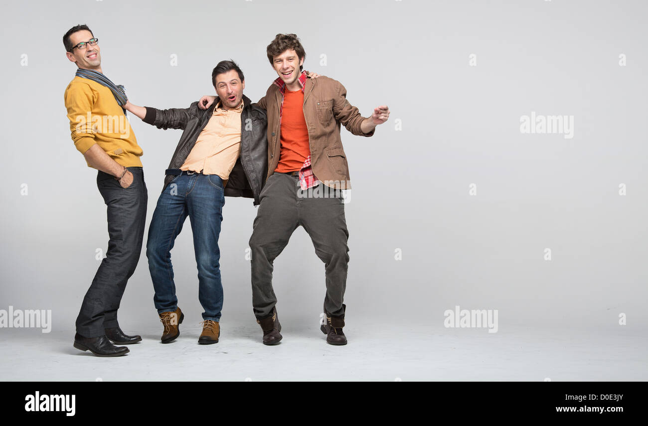 Male friends having great fun Stock Photo - Alamy