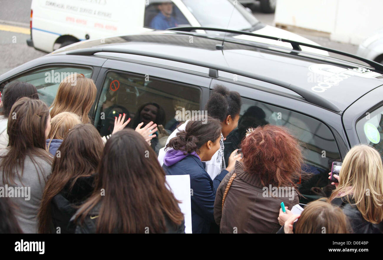 Fans mob a car transporting One Direction X Factor finalists arrive at ...