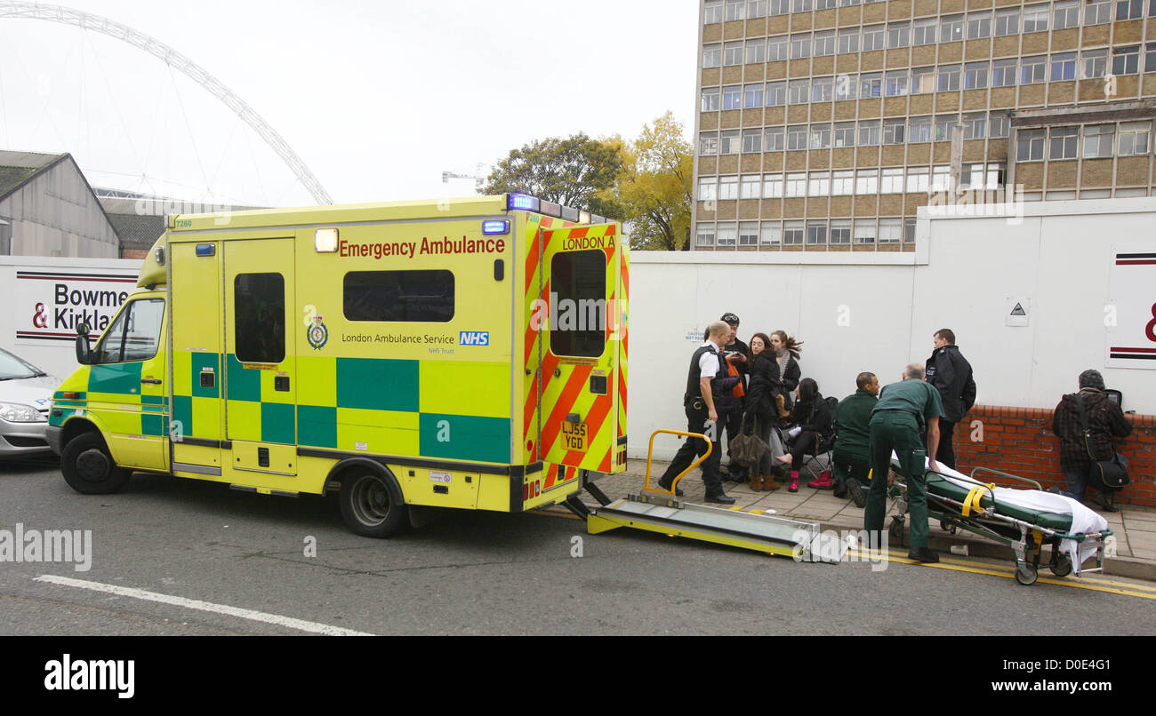 An X Factor fan is taken away in an ambulance with a leg injury after ...
