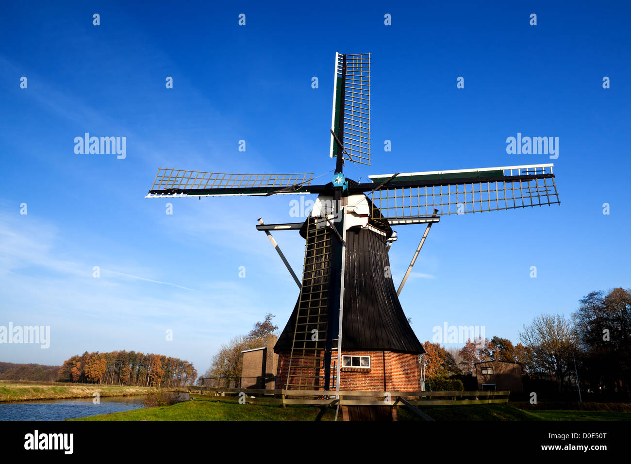 wooden Dutch windmill over clear blue sky Stock Photo - Alamy