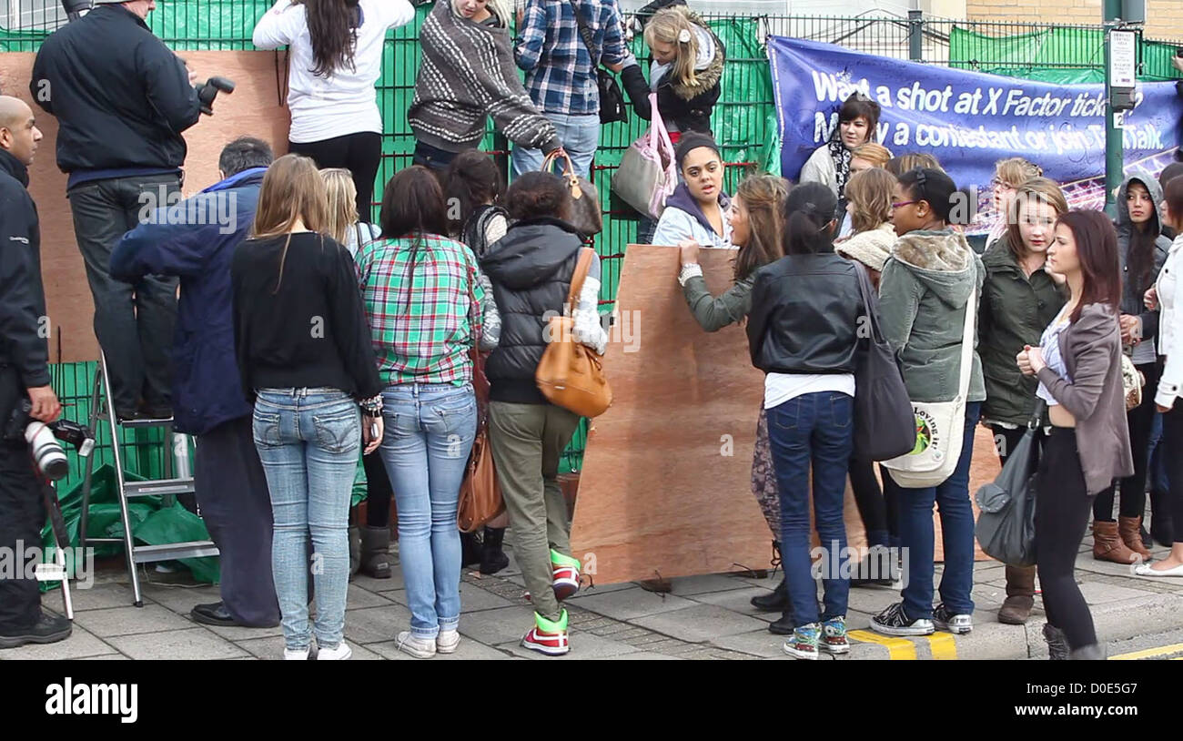 Young X Factor fans run riot outside the X Factor studios in rth London ...