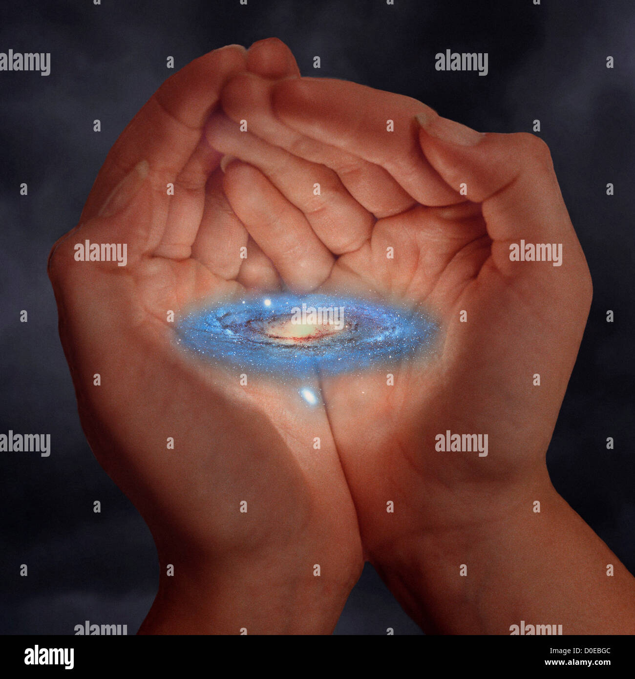 Galaxy In Good Hands Stock Photo - Alamy