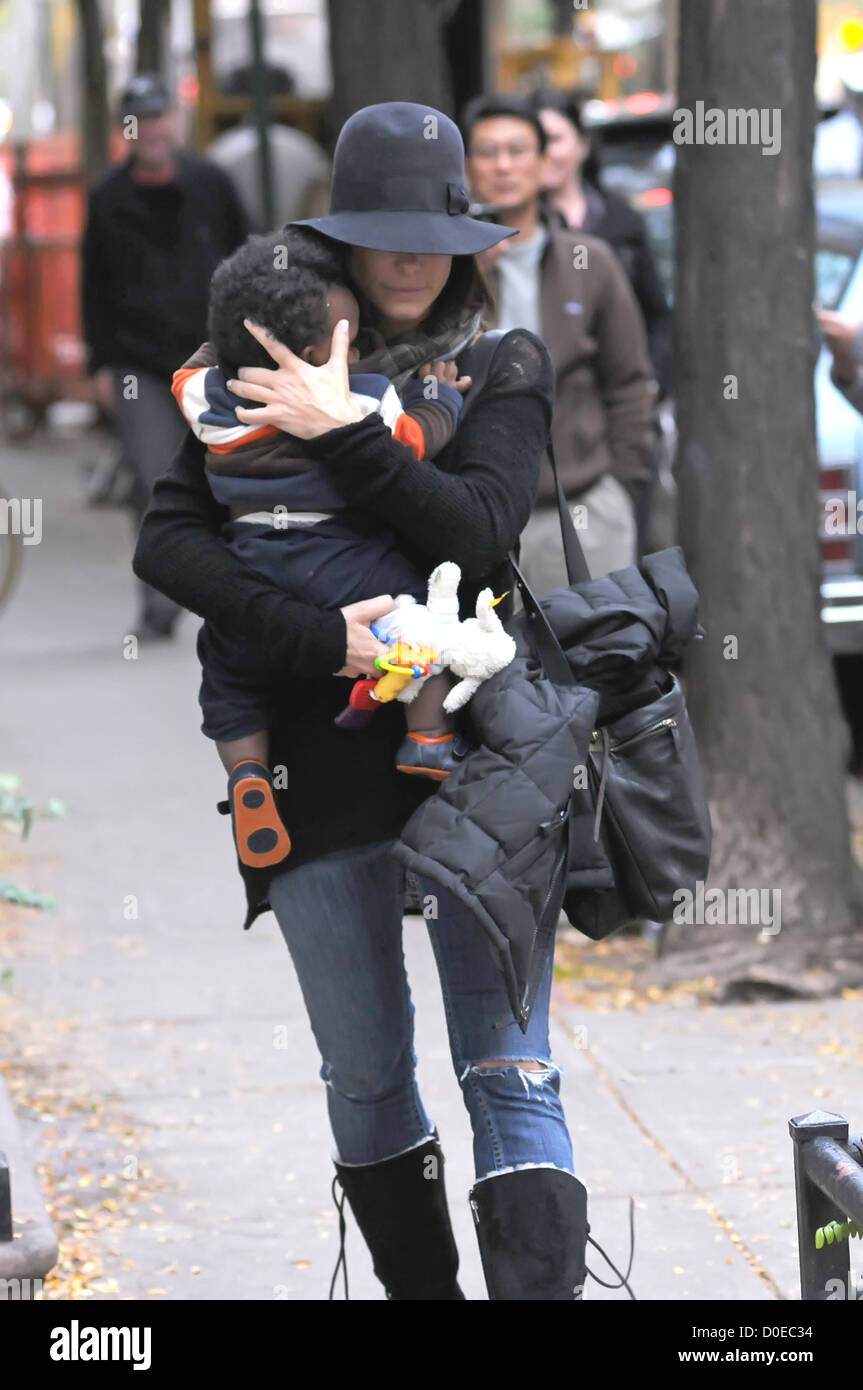 Sandra Bullock leaving her apartment, carrying son Louis Bardo New York ...