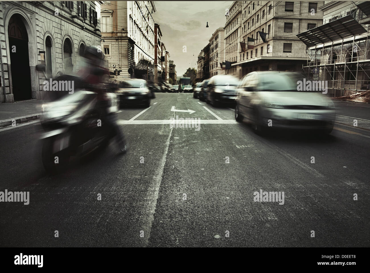 Amazing view of traffic in small italian city Stock Photo - Alamy