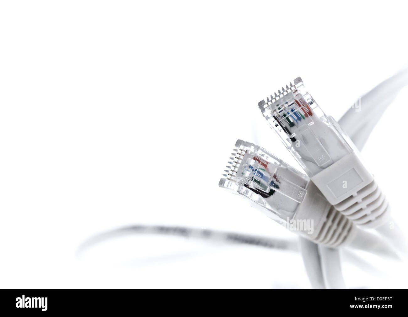 cable and two rj45 plugs over white background, decorative technology ...