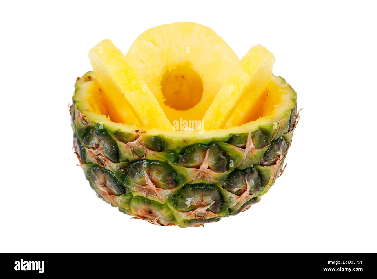 the discs of pineapple in salad bowl from shell isolated on white ...
