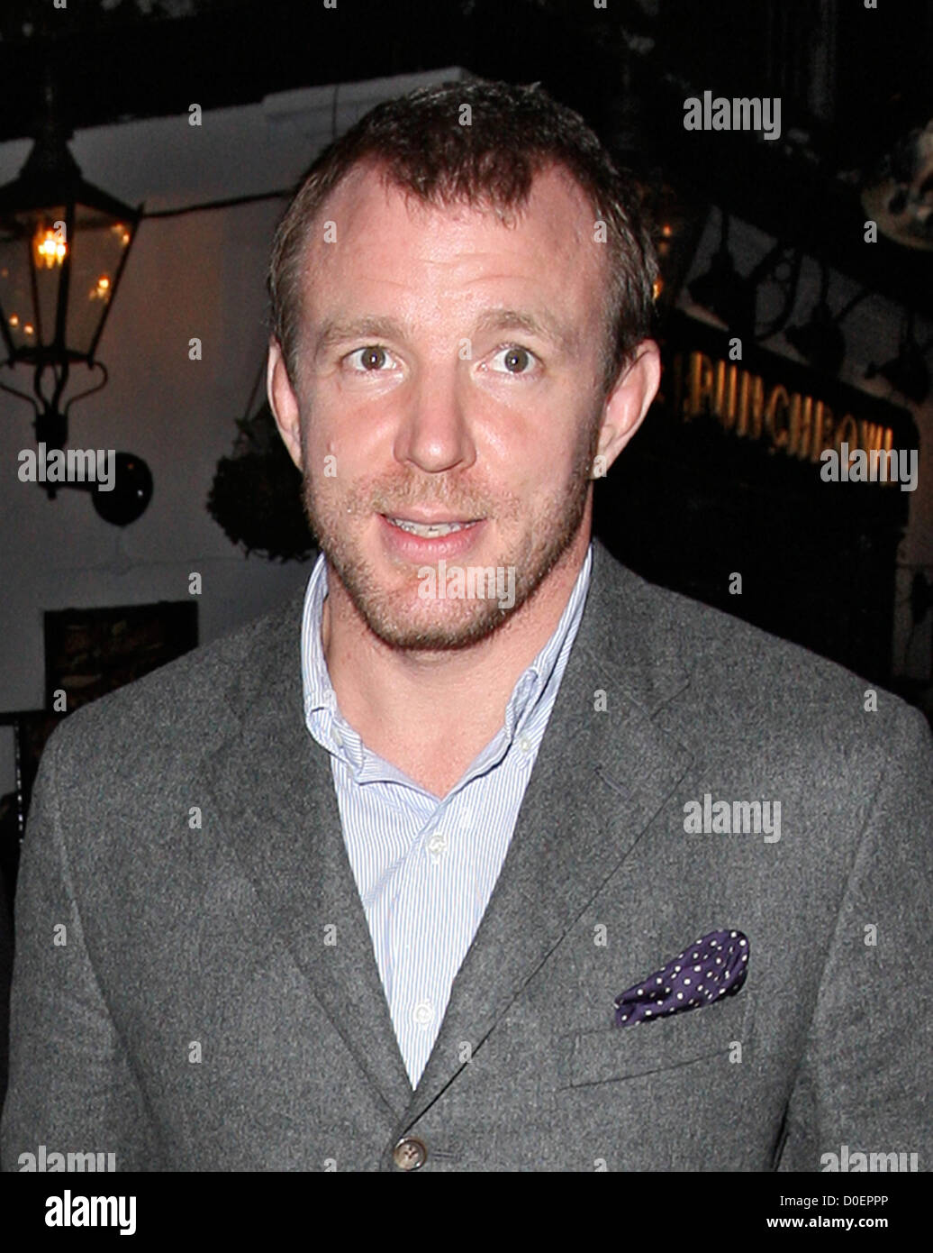 Guy Ritchie leaves the Punchbowl pub which has recently had a makeover ...