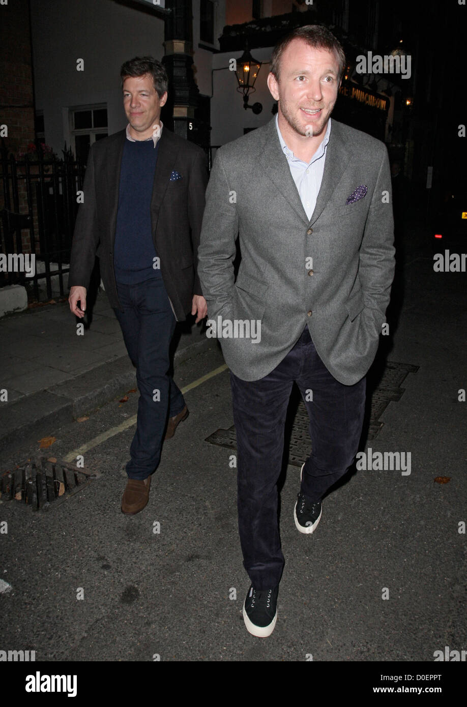 Guy Ritchie leaves the Punchbowl pub which has recently had a makeover ...