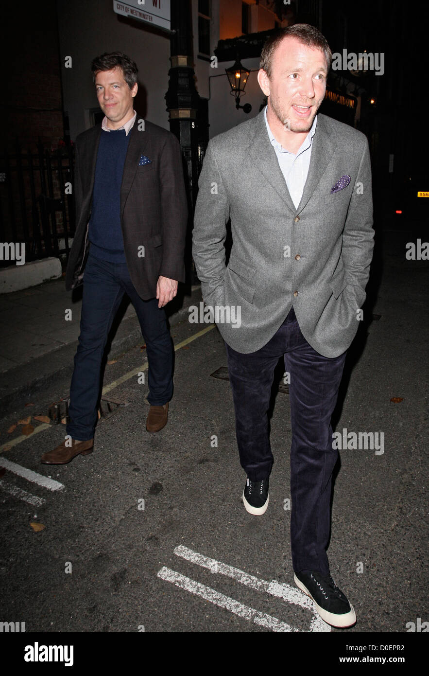 Guy Ritchie leaves the Punchbowl pub which has recently had a makeover ...