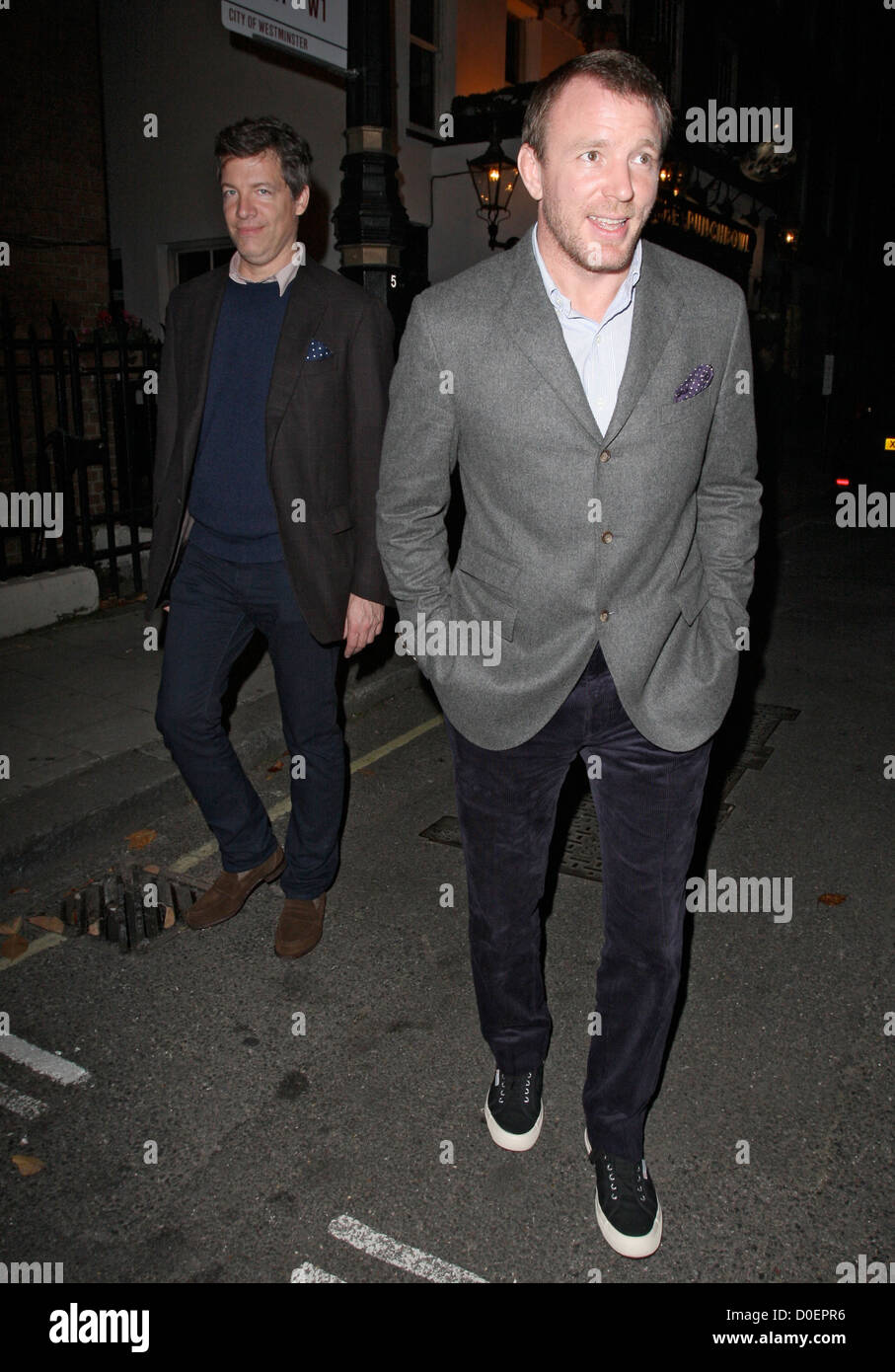 Guy Ritchie leaves the Punchbowl pub which has recently had a makeover ...