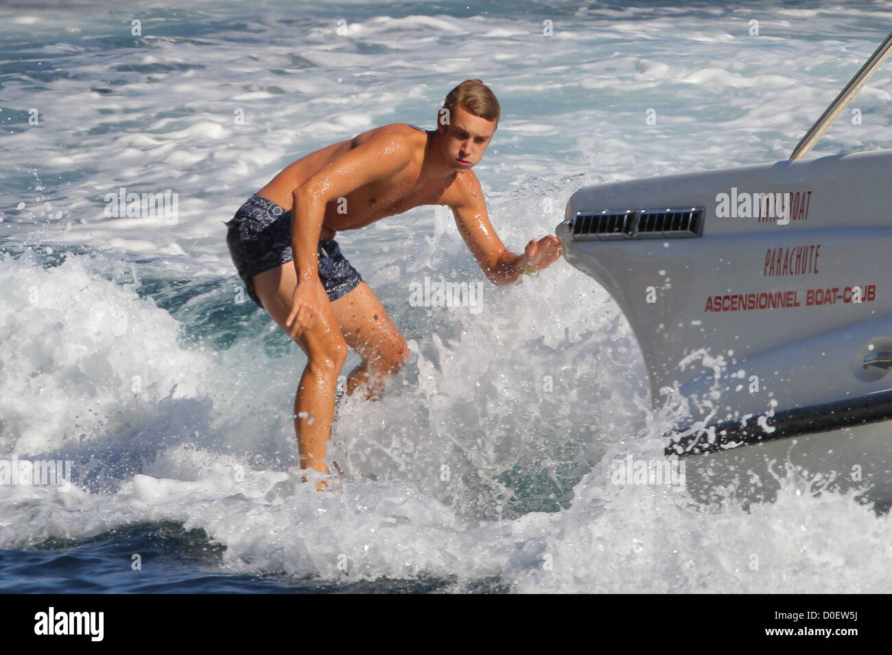 Pierre Casiraghi surfing with friends at the Monte-Carlo Beach club ...