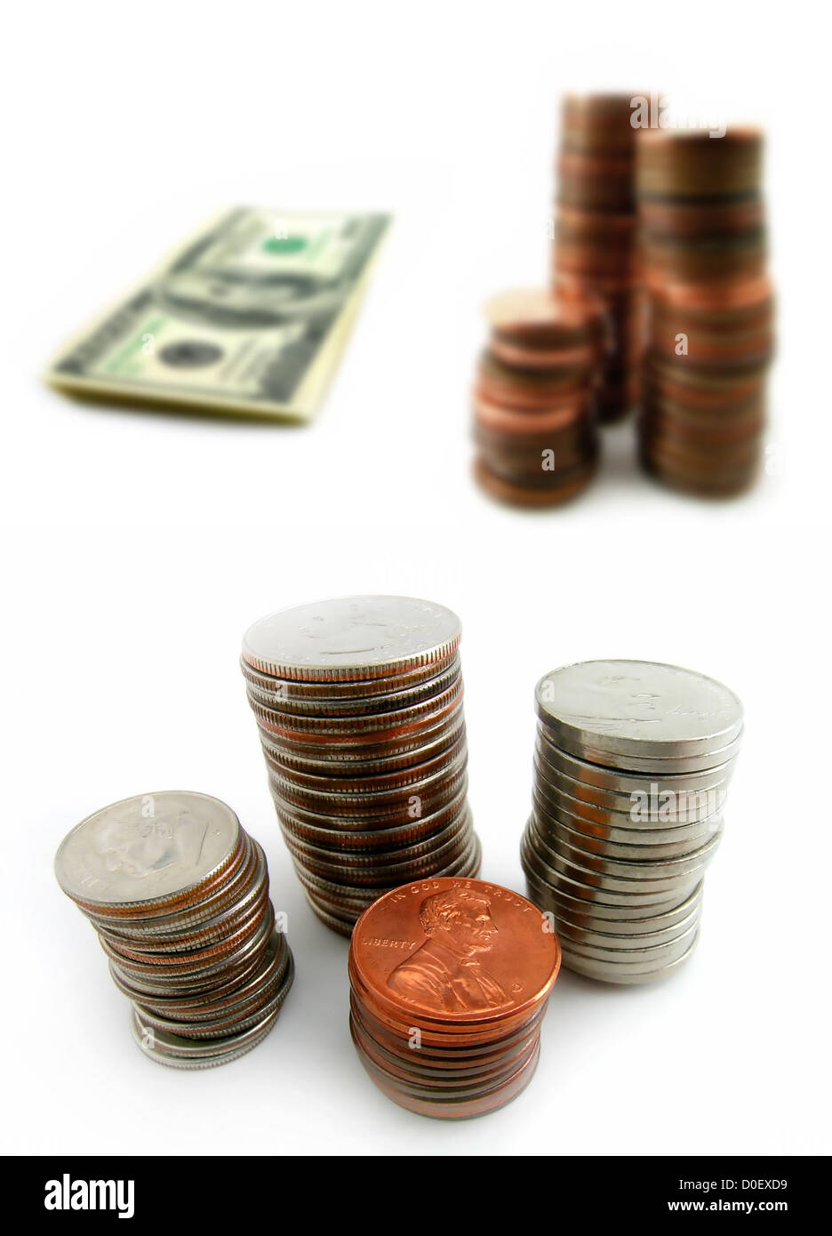 Several stacks of coins and cash isolated on white background Stock ...