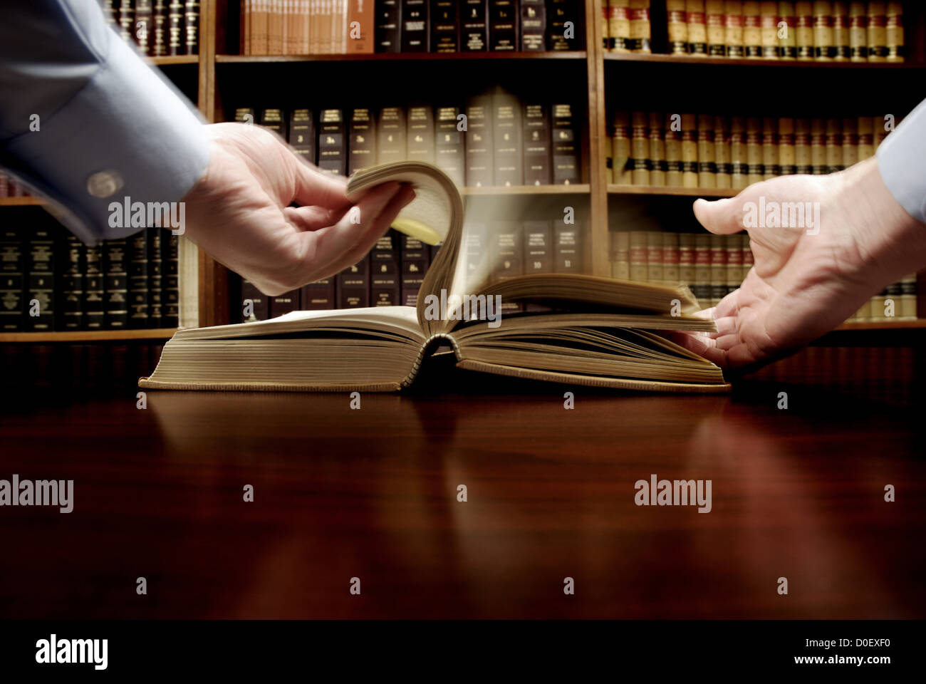 Hands holding book hi-res stock photography and images - Alamy