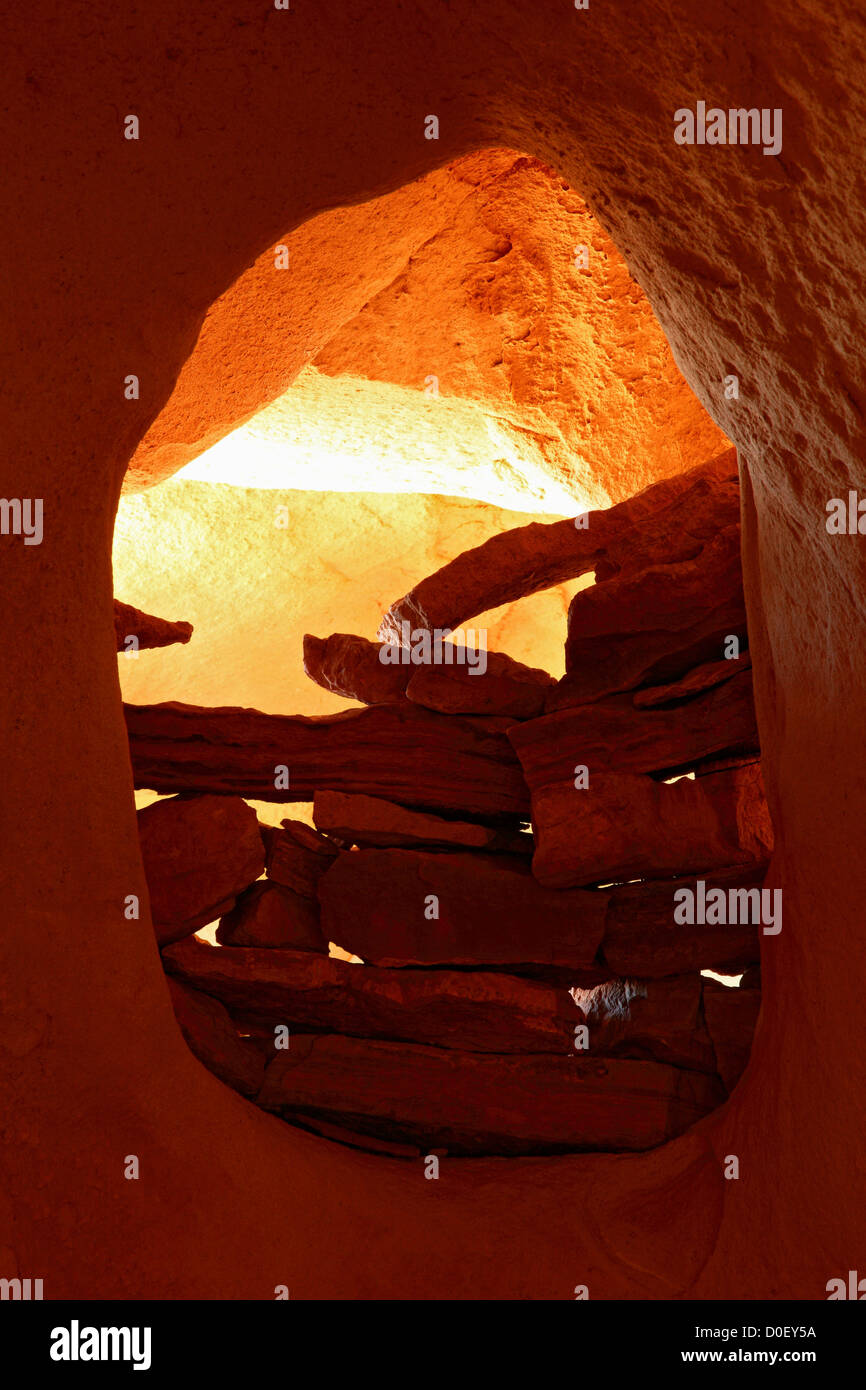 A window in a natural rock window at an Anasazi granary, at Aztec Butte ...