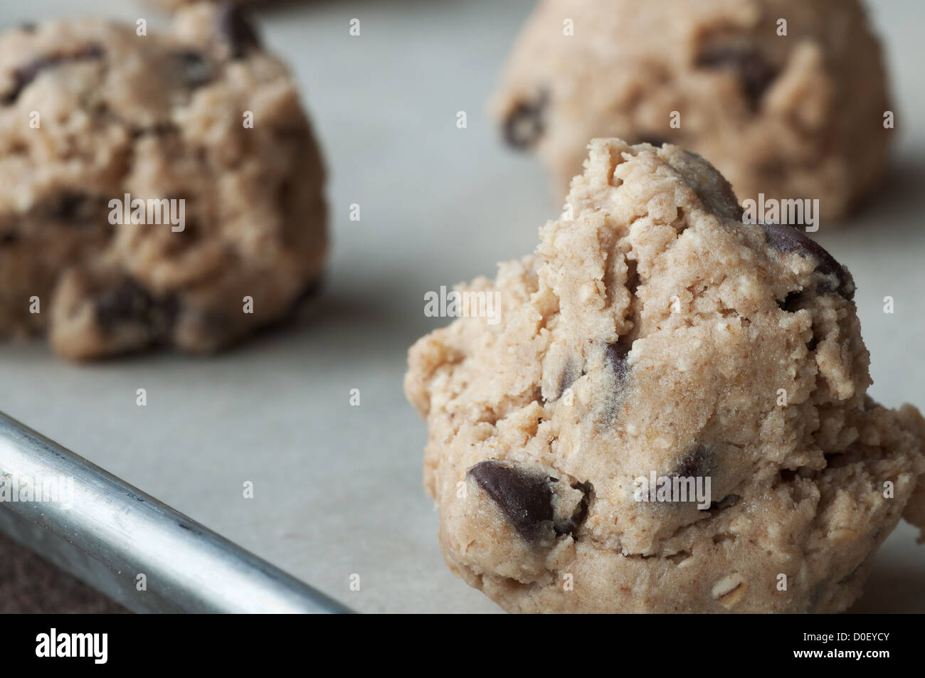 Cookie dough drops ready for the oven Stock Photo - Alamy