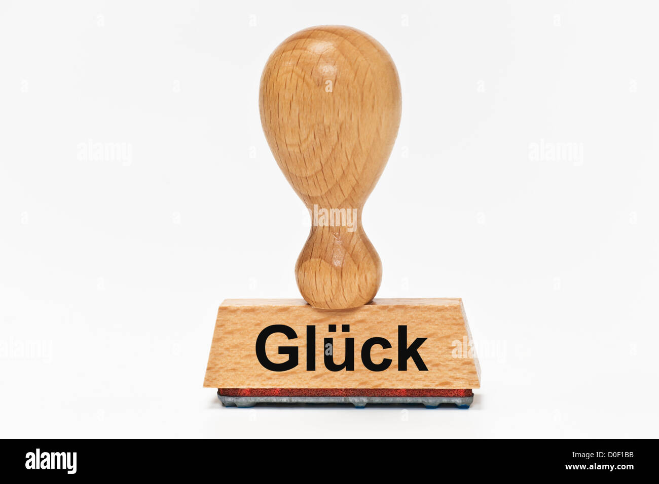 One Stamp with the German inscription Glück (Luck) upright, background ...