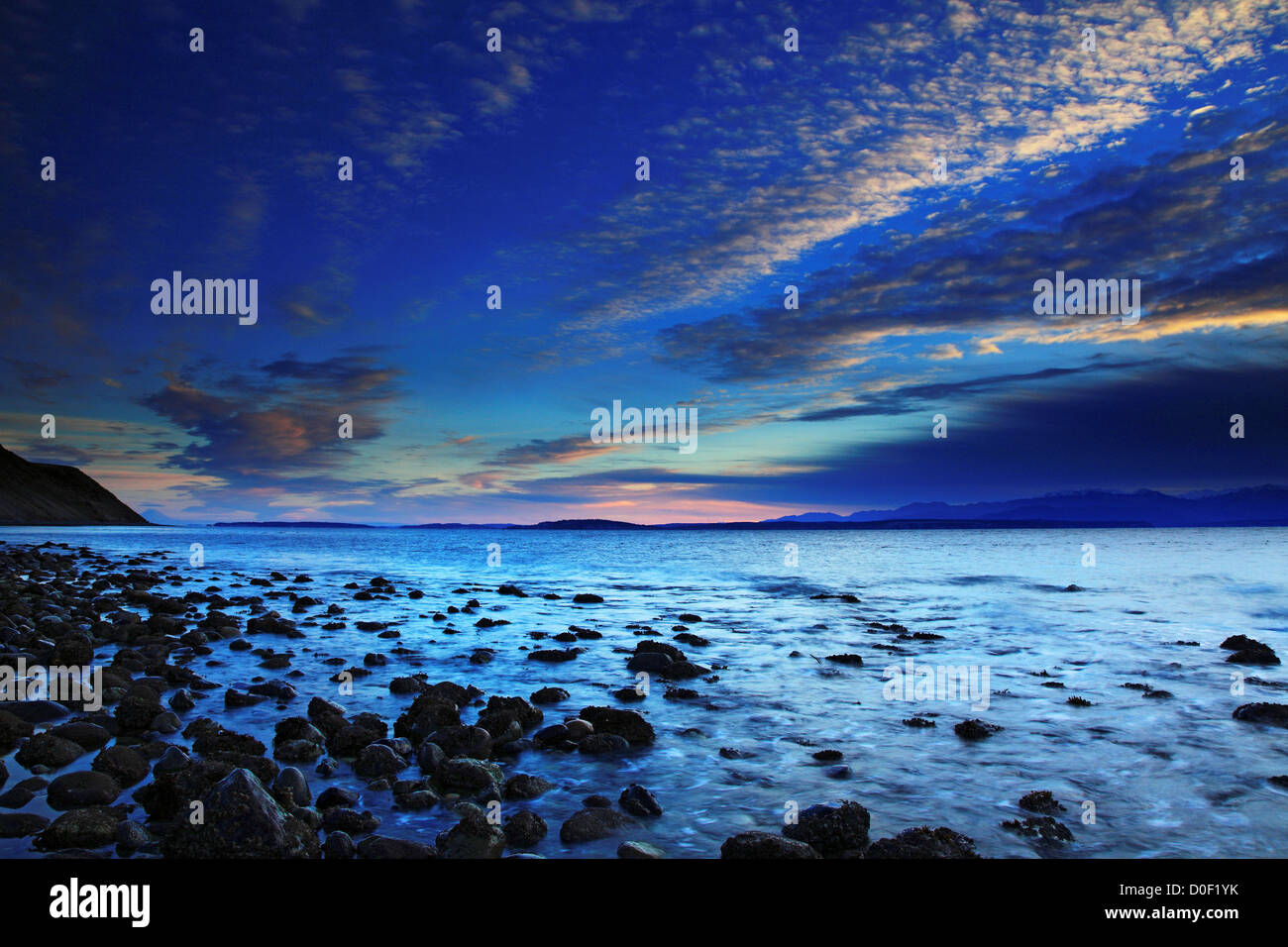 Sunset afterglow on rocky Ebey's Beach, at Fort Ebey State Park ...