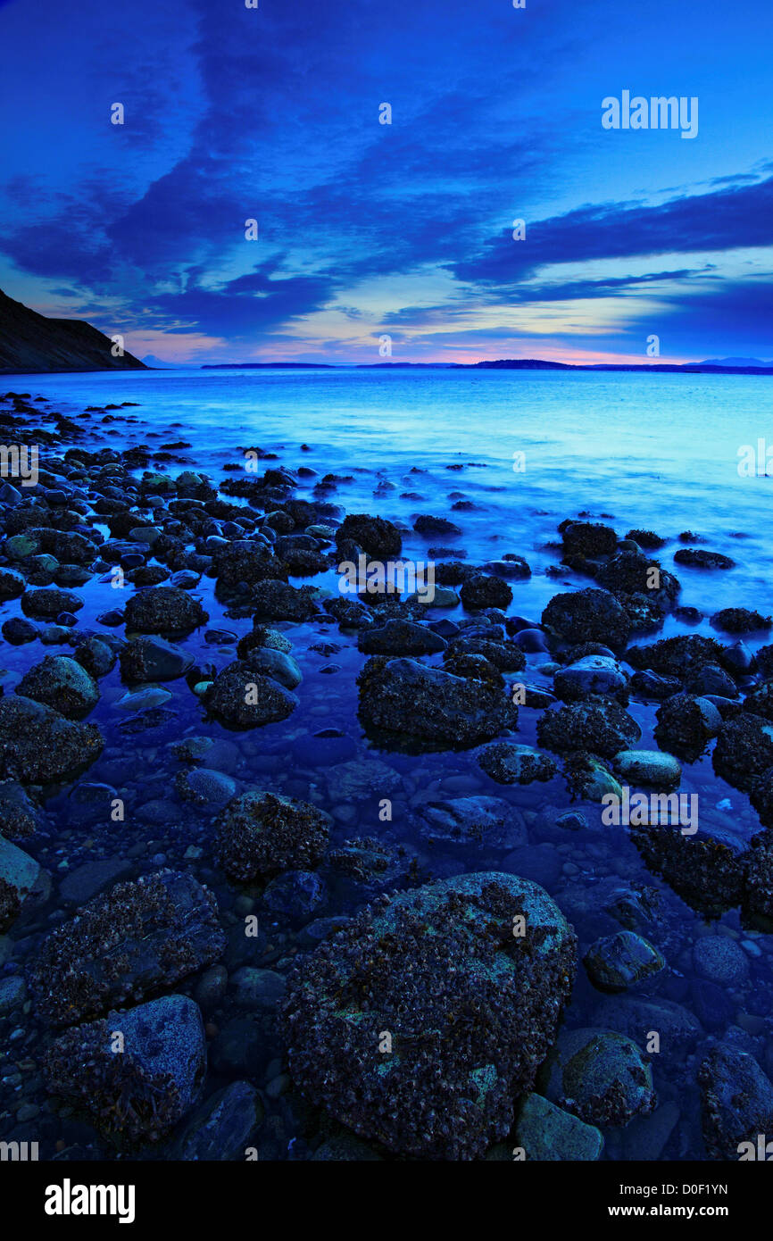 Sunset afterglow on rocky Ebey's Beach, at Fort Ebey State Park ...