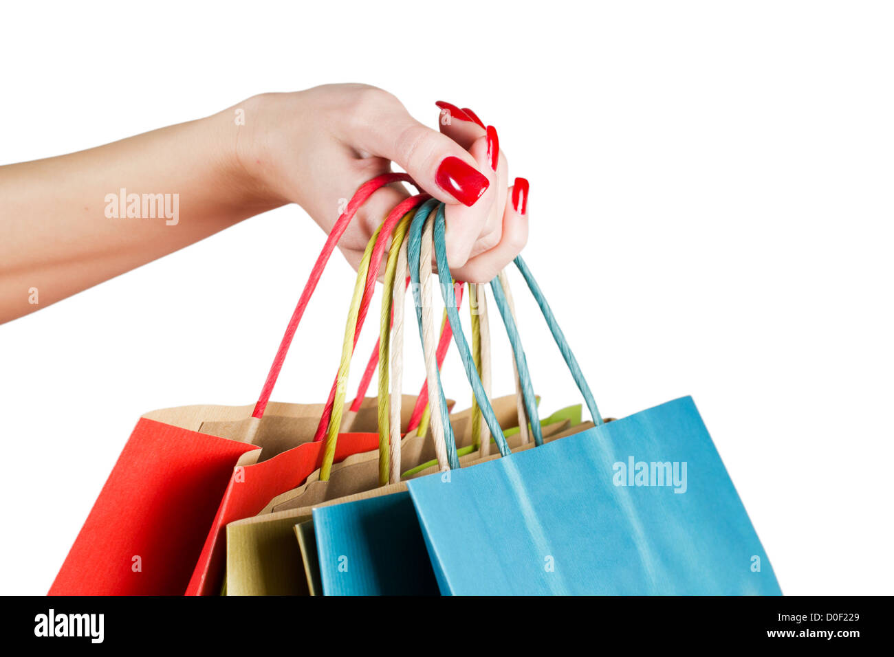 Female hands hold colorful shopping bag Stock Photo - Alamy