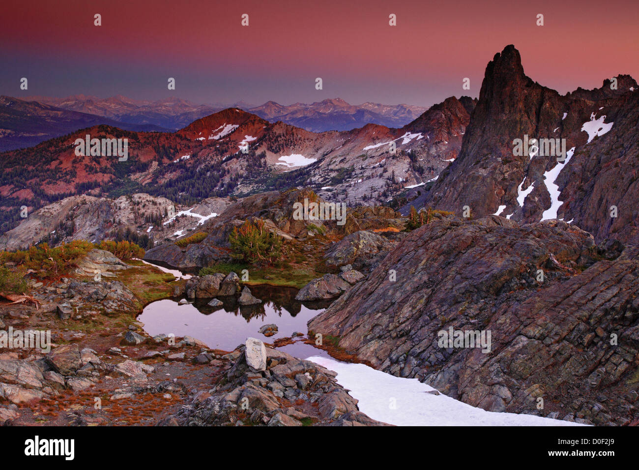 Sunset over a tarn and the High Sierras from Minaret Pass in the Ansel ...