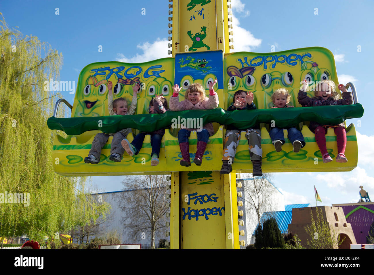 Children riding on a fairground ride at Flamingo land resort in North ...