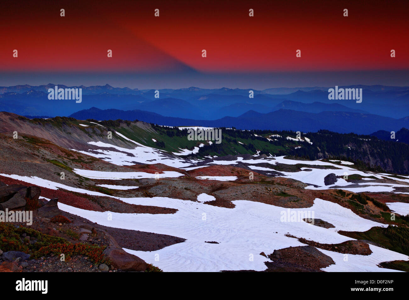 Mount Rainier casts a shadow at sunset, viewed from Panorama Point in ...