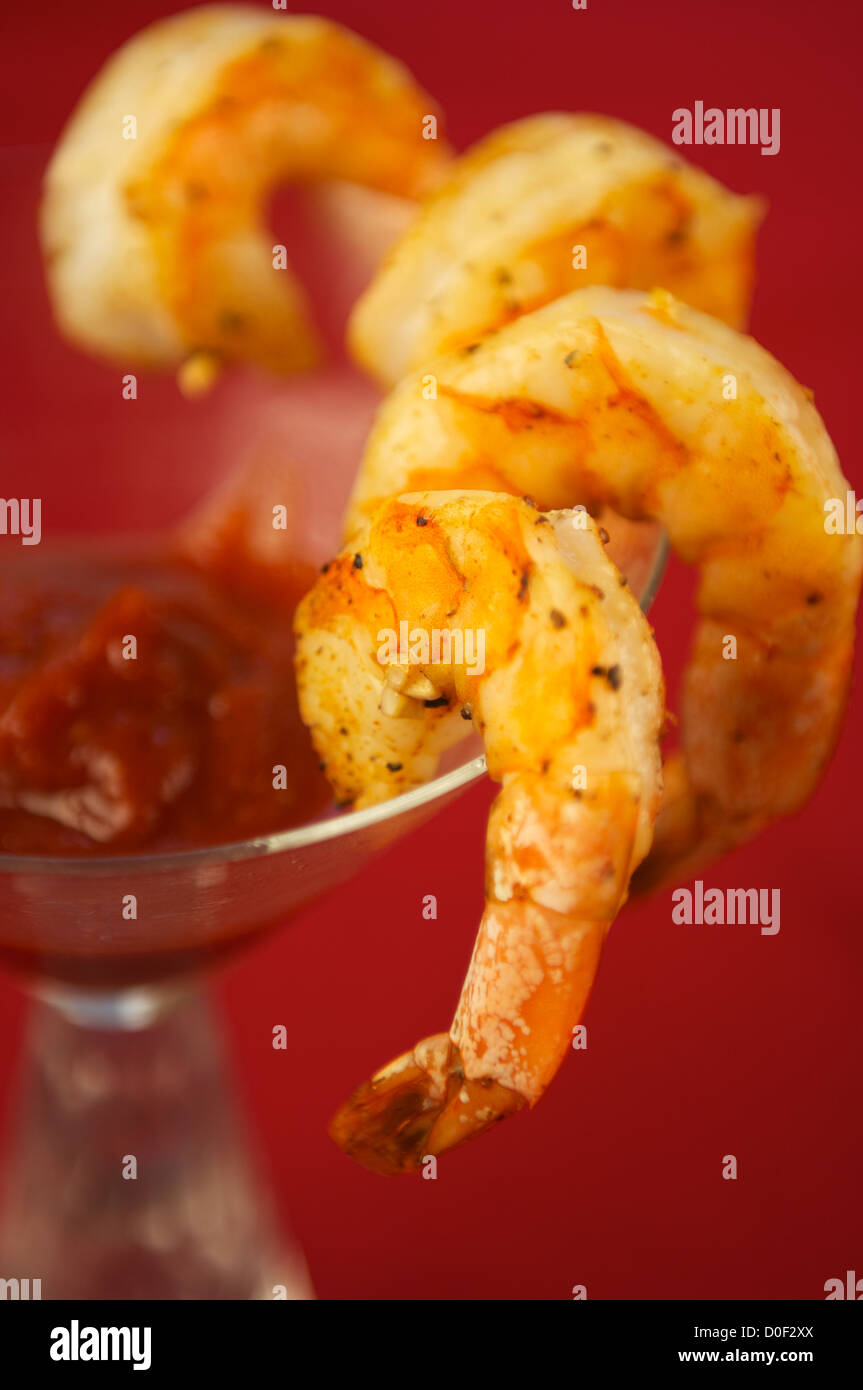 shrimp with cocktail sauce and lemon twirl Stock Photo - Alamy