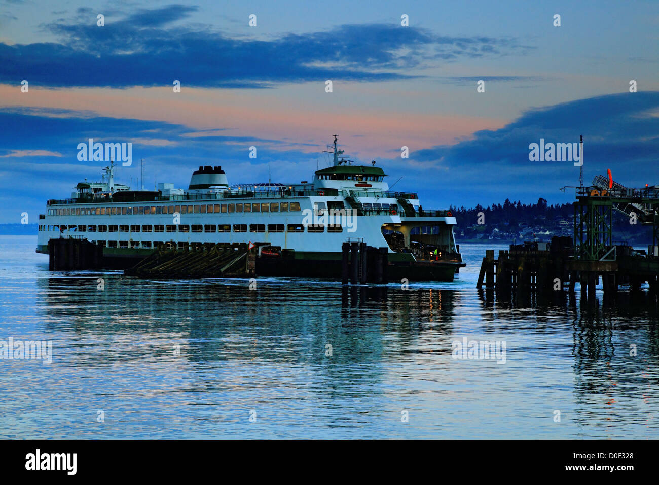 Ferry approaching Kingston Terminal in Washington at sunset Stock Photo ...